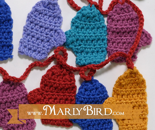 Ravelry: Quick Mini Mitten Garland pattern by Marly Bird