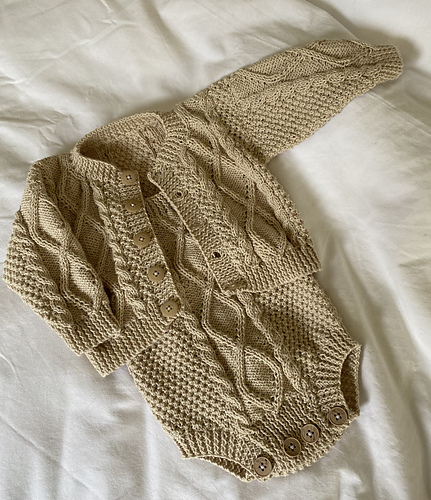 Ravelry: Mini Aran Cardigan pattern by Jackie Platt
