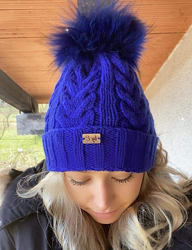 Ravelry: Electric Blue Hat with PomPom pattern by Erika Nemec