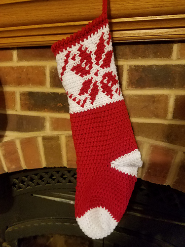 Ravelry: Fair Isle Snowflake Christmas Stocking pattern by Kara Gunza