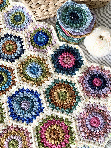 Ravelry: Hygge Burst Hexie Blanket pattern by Mallory Krall
