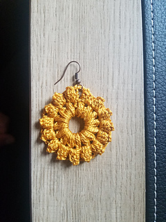 Ravelry: Sunburst Medallion Earrings pattern by Perla Millan
