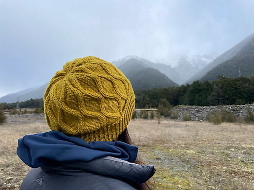 Ravelry: Wavy Cable Hat pattern by Purl Foundry