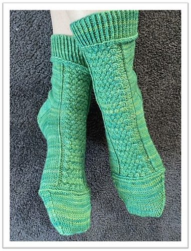 Ravelry: The Braided Socks pattern by Raewyn Read-Eden