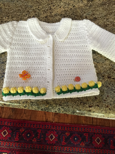 Ravelry: Tulip field baby cardigan pattern by rania janbayn