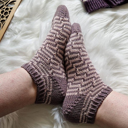 Ravelry: Daedalus DK Socks pattern by Kelly Menzies