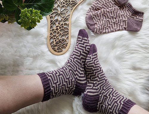 Ravelry: Daedalus DK Socks pattern by Kelly Menzies
