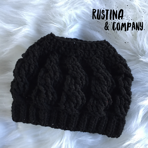 Ravelry: Cabled Messy Bun Beanie pattern by Rusti Jackson