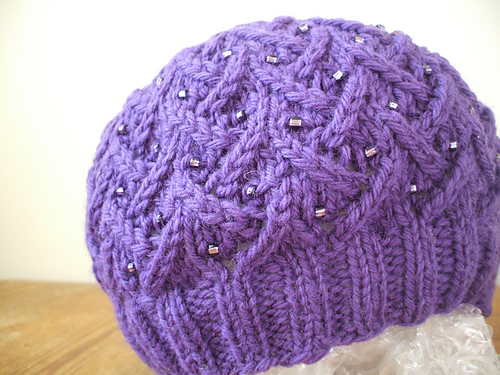 Ravelry: Lotus Hat pattern by UptownPurl