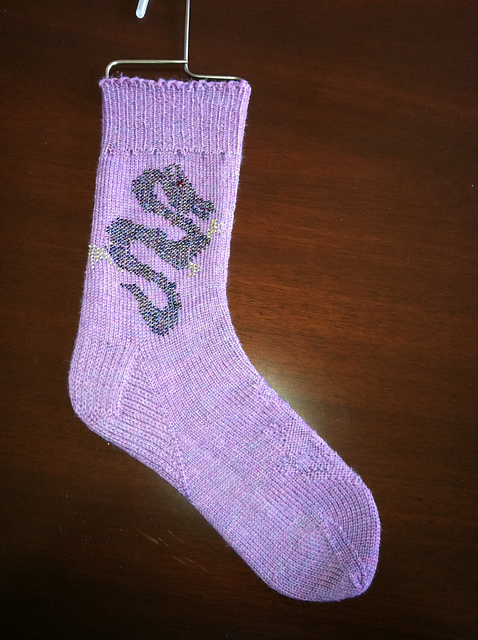 Ravelry: Purple Dragon Socks pattern by Spinfoolish