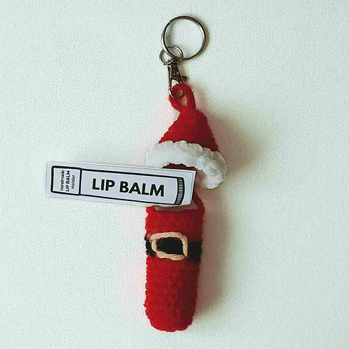 Ravelry: Santa Lip Balm Cozy Keychain pattern by May Shehab