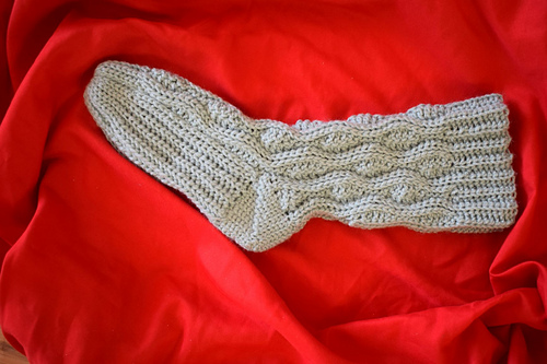 Ravelry: Aran Wave Socks pattern by Sophie and Me-Ingunn Santini