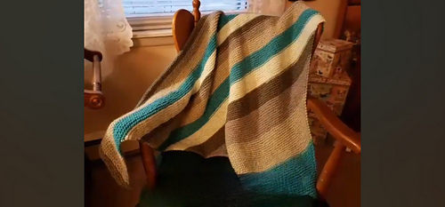 Ravelry: Triangle Knitted Shawl pattern by Fiber Spider