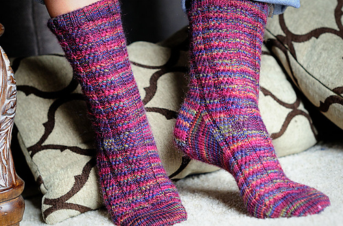 Ravelry: Fascine Braid Socks pattern by Caryll Bilbao