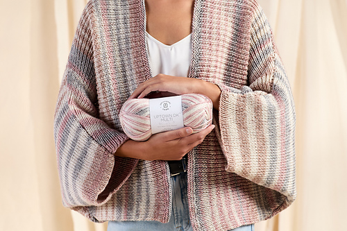 Ravelry: Sideways Ribbed Shrug pattern by Universal Yarn