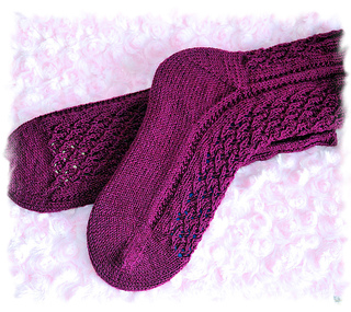 Ravelry: Feather Lace Toe Up Socks pattern by Wilma Becker