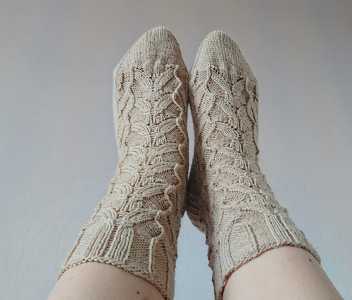 Ravelry: Tidal Waves Socks pattern by There She Knits