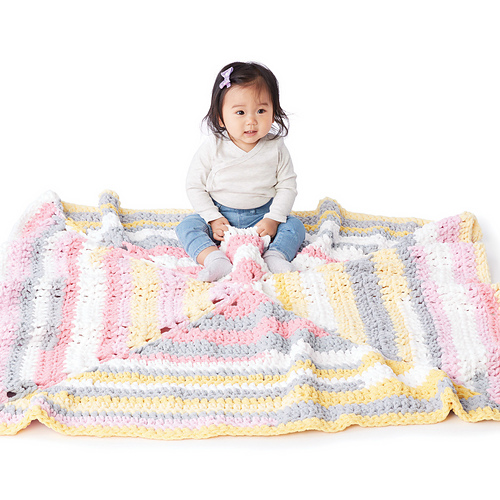 Ravelry: Radiating Baby Blanket pattern by Yarnspirations Design Studio