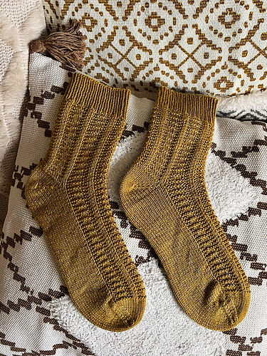 Golden Ladder Socks is my third sock pattern release. It was so much ...