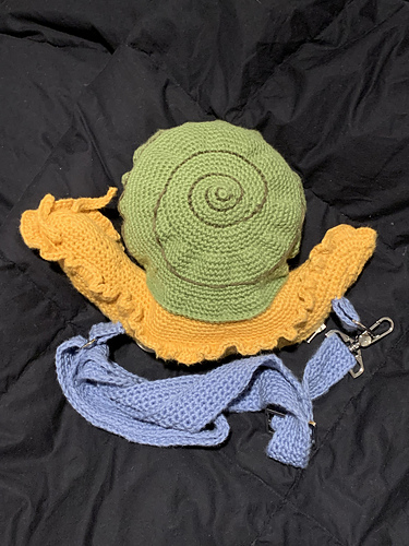 Ravelry: Snail Backpack pattern by CouleeCraft