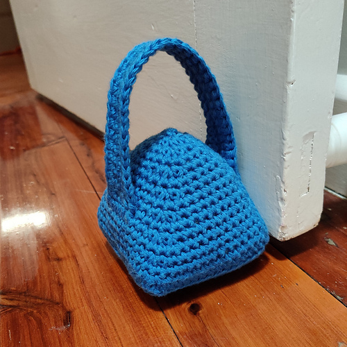Ravelry: Pyramid Doorstop pattern by Veronika Cromwell