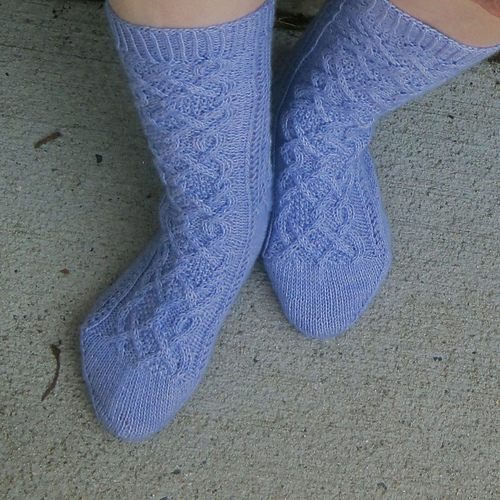 Ravelry: Kelona Cabled Socks pattern by Linda Lehman
