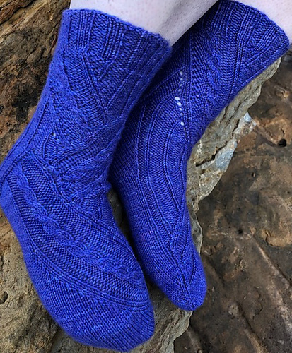Ravelry: Clash of Cables Socks pattern by Anye M. Shafer