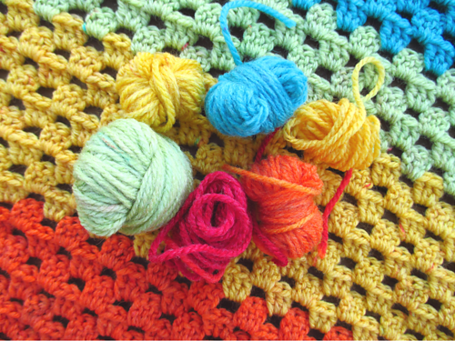 Ravelry: Triangle Scarf with Fringe pattern by Ashlea Schumaker