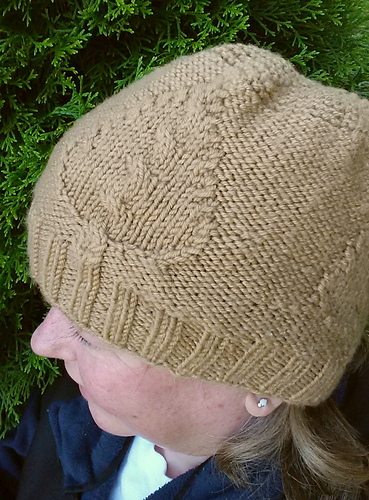 Ravelry: Windblown Leaf Cabled hat pattern by Carmen Nuland