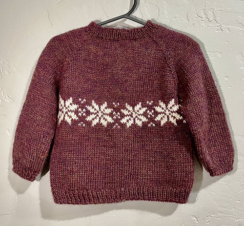 Ravelry: Nordic Snowflake Infant Sweater pattern by aubreytealknits
