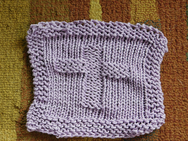 Ravelry: Loom Knit Cross Washcloth pattern by Ashly Ortmanns
