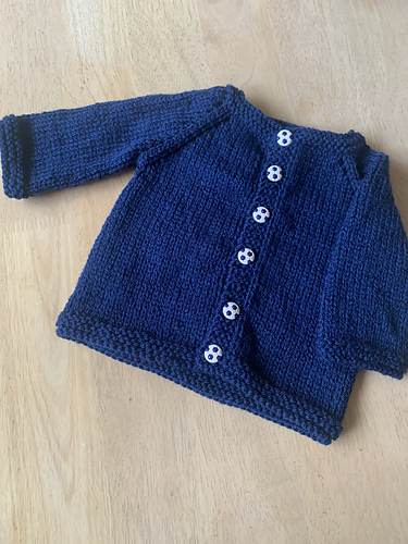 Ravelry: Max Baby Cardigan with Eyelet Raglan pattern by marianna mel