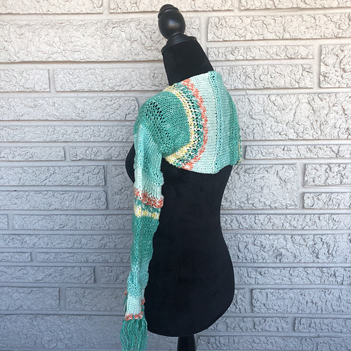 Ravelry: Minty Fringe Shrug pattern by Loom Knit Designs with BOHLD