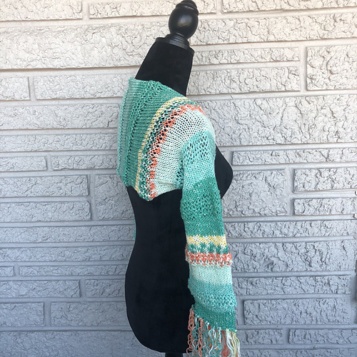 Ravelry: Minty Fringe Shrug pattern by Loom Knit Designs with BOHLD