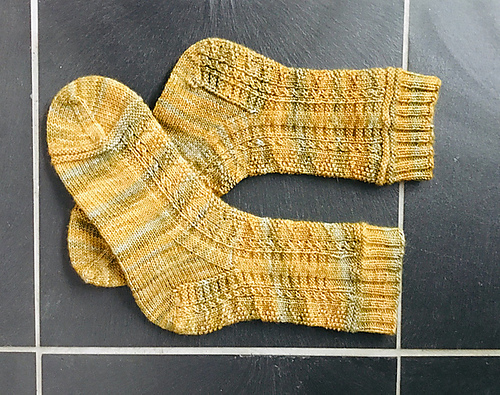 Ravelry: Gold Cove Socks pattern by Sandra Buzza