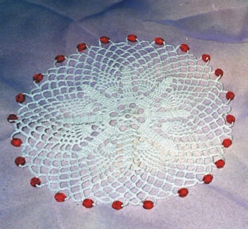 Ravelry: Cate's pineapple lace beaded creamer cover. pattern by ...