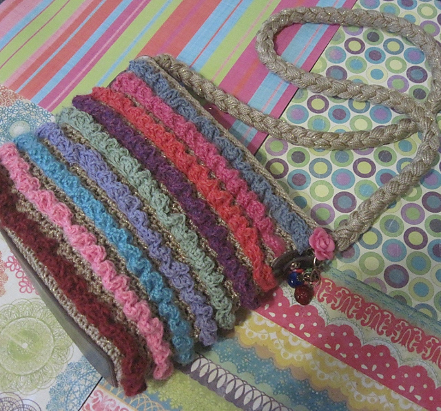 Ravelry: Upcycled Frilly Purse pattern by Lisa Mertes