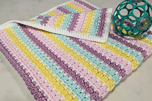 Ravelry: Easy Clusters Baby Blanket pattern by Susan Lowman