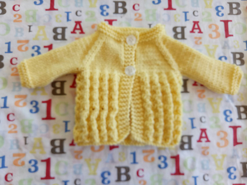 Ravelry: Little Surprise Baby Jacket pattern by marianna mel
