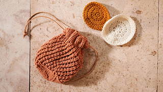 Ravelry: Knitted bag with a drawstring pattern by Søstrene Grene