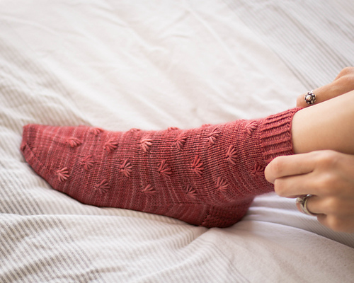 Ravelry: Shell Strand Socks pattern by Dawn Hamblin