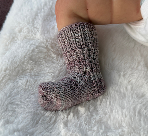 Ravelry: Ray of Honey Baby Socks pattern by Amanda Saladin