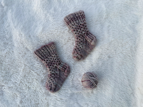 Ravelry: Ray of Honey Baby Socks pattern by Amanda Saladin
