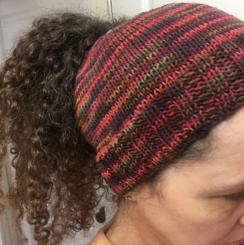 Ravelry: Sock Yarn Messy Bun Beanie pattern by Suzanne Kimbrell