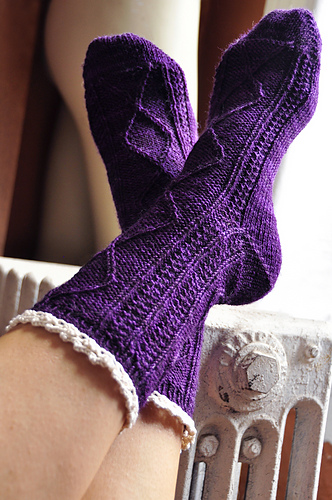 Ravelry: "Diamond in the Ruffle" Cable Knit Socks pattern by Lauren Riker