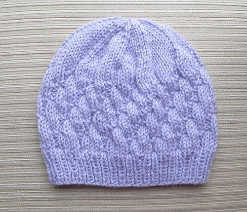 Ravelry: Hat with Faux Diagonal Cables pattern by Yelena Chen