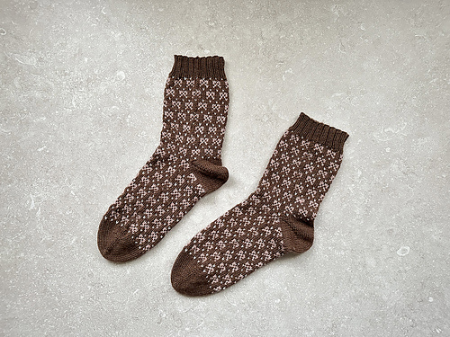 Ravelry: Tiny bows Socks pattern by Sangmi Lee