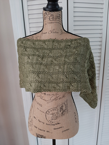 Ravelry: Cascading Cables Shoulder Cozy pattern by Kim Grandmaison