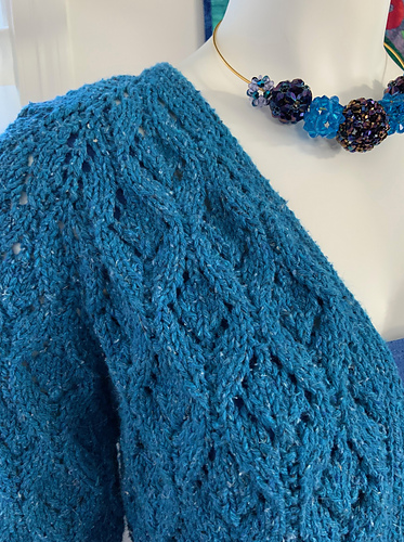 Ravelry: Tulips Cardigan pattern by Jeri Riggs