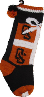 Ravelry: Black & Orange Present Christmas Stocking pattern by Robin Denney